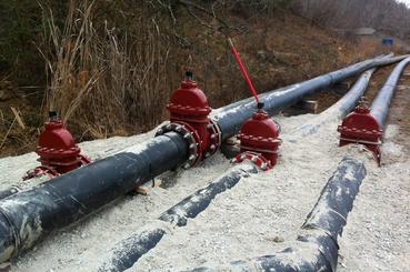 Ash Line Piping | Utter Construction Inc.